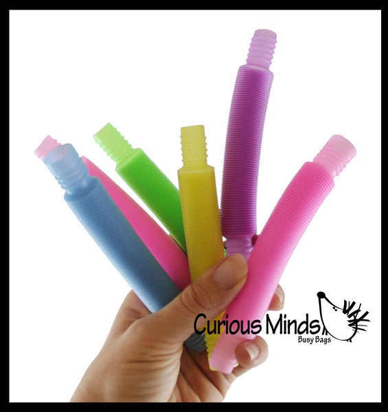 Small Glow in the Dark Pull and Pop Fidget Snap Expanding Flexible Acc ...