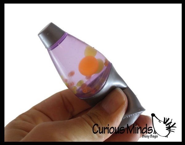 NEW - Mini Lava Lamp Squish and Flow Stress Ball Nee Doh. Squeeze to P ...