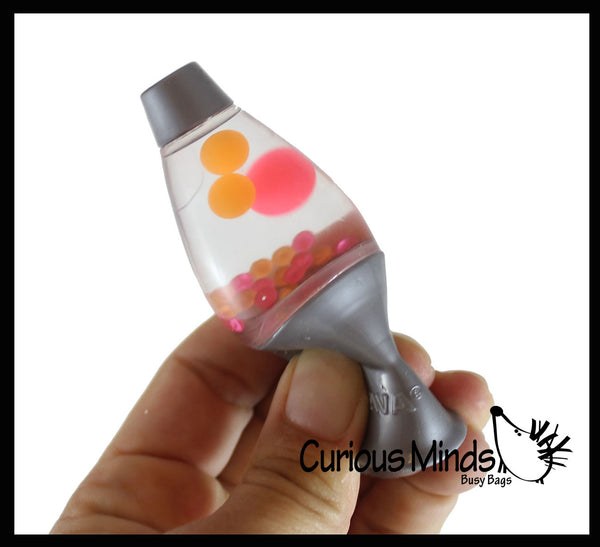 NEW - Mini Lava Lamp Squish and Flow Stress Ball Nee Doh. Squeeze to P ...
